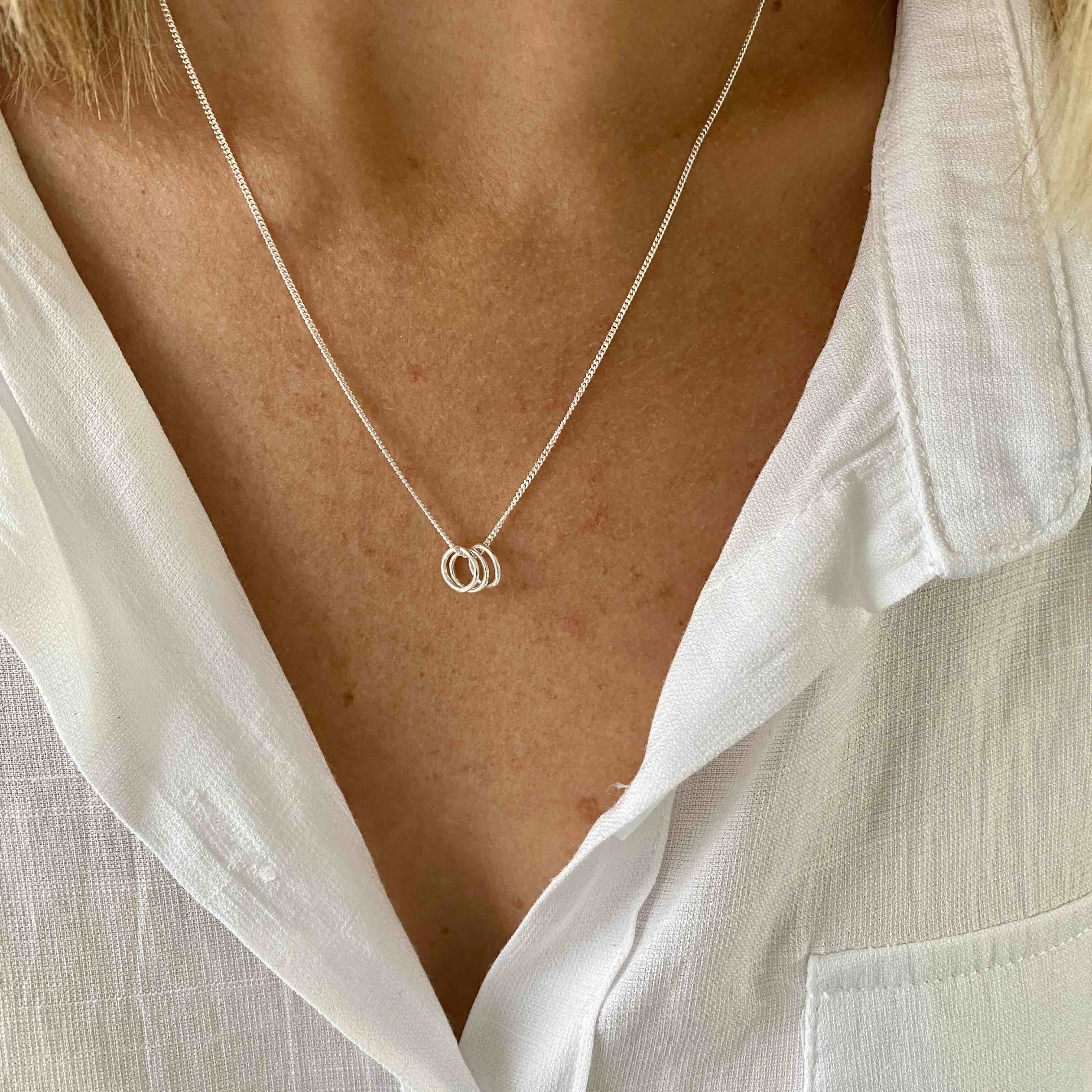 Silver necklace with ring store